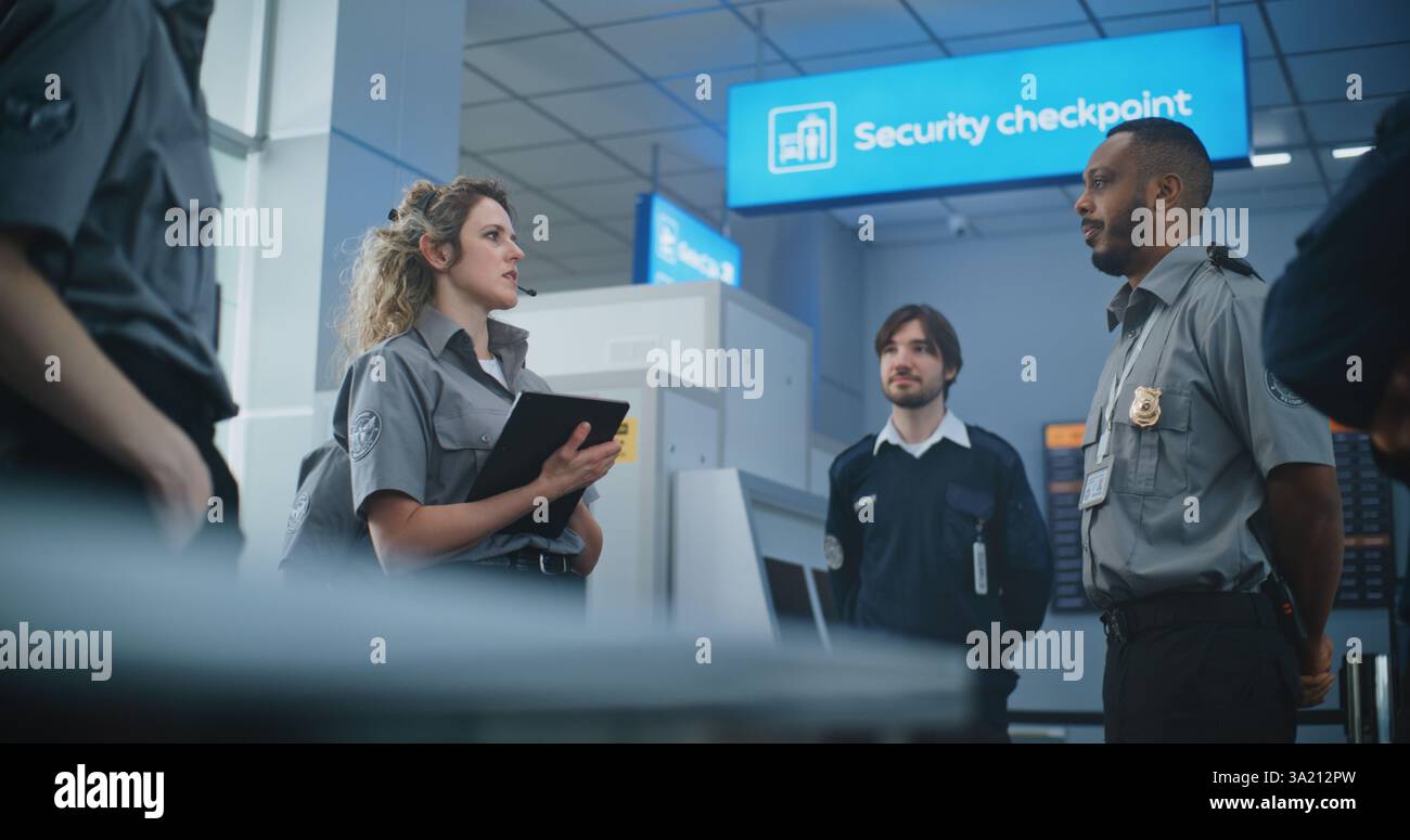 Airport Staff Briefing: Female TSA Officer with Tablet Computer Wearing ...