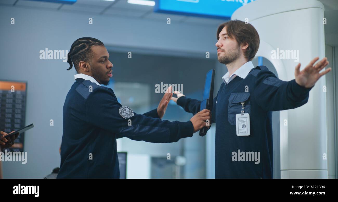 Airport Security Staff: African American TSA Officer Conducting ...