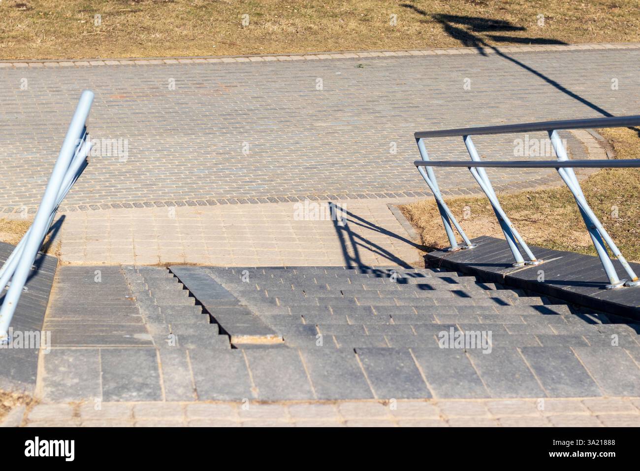 Outdoor stairs with deformed railings Stock Photo - Alamy