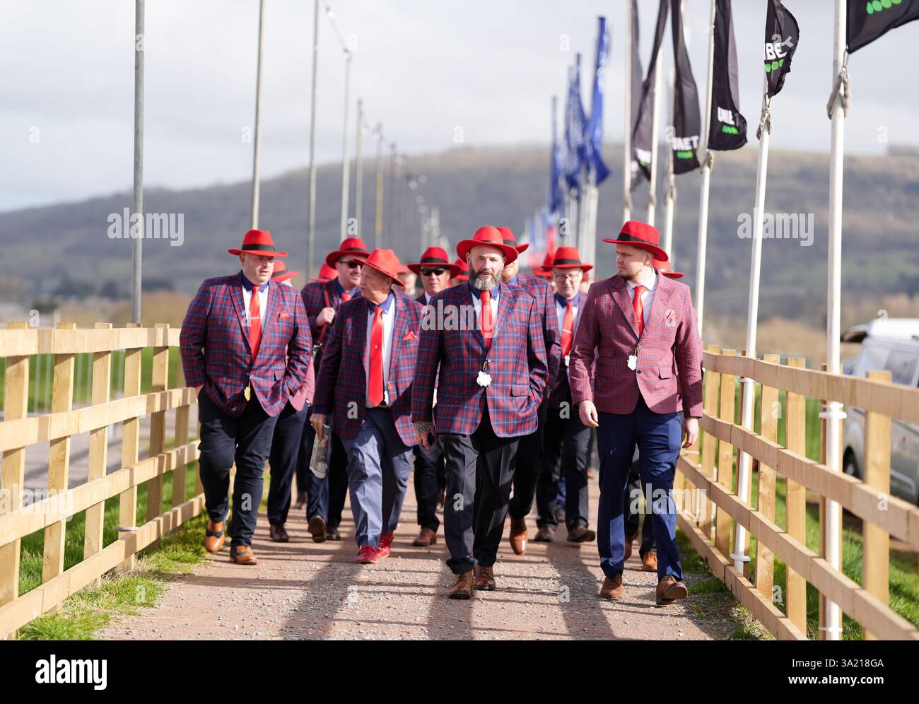 Racegoers arrive for day one of the 2025 Cheltenham Festival at ...