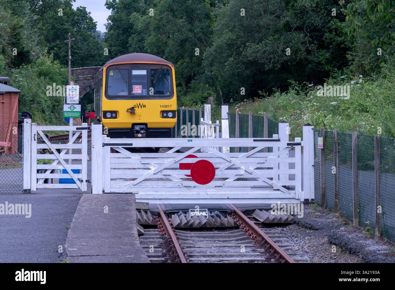 Looking Down the Tracks at the Railwayn Crossing and Locomotive ...