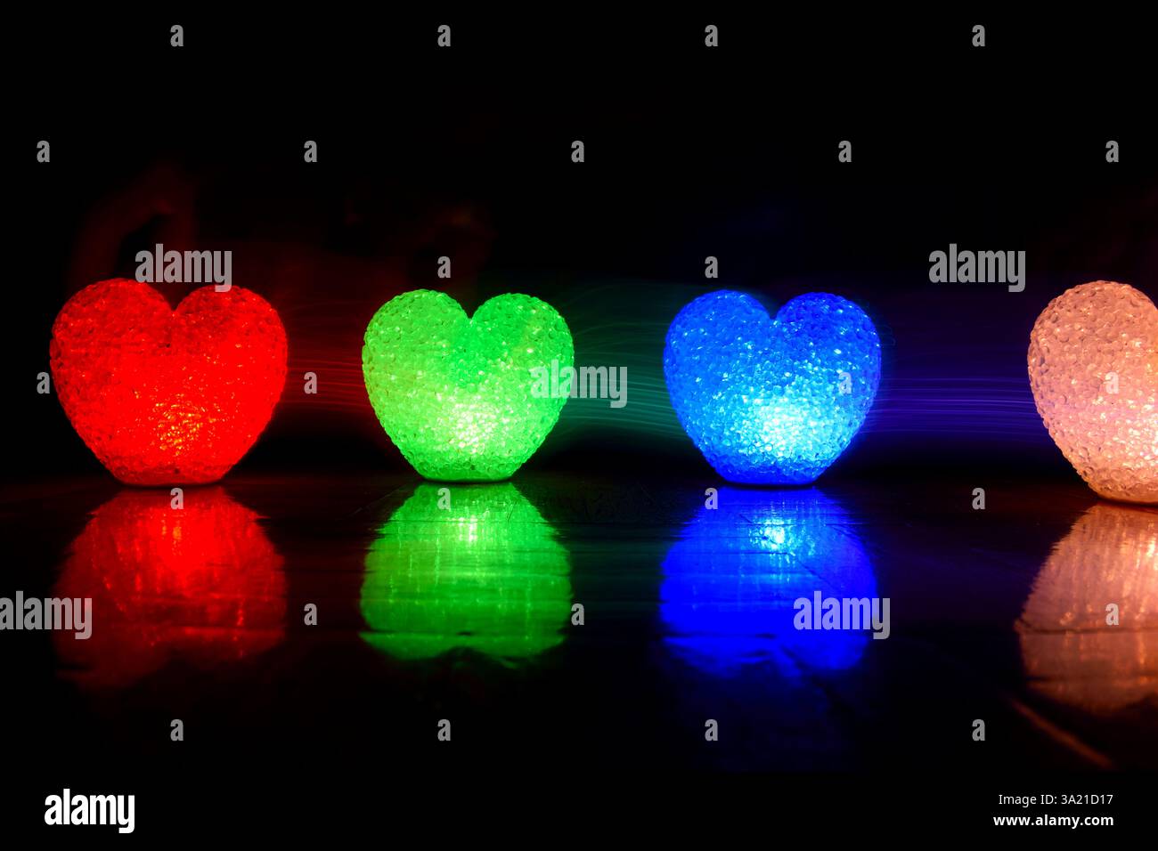 Bright glow hearts light hi-res stock photography and images - Alamy