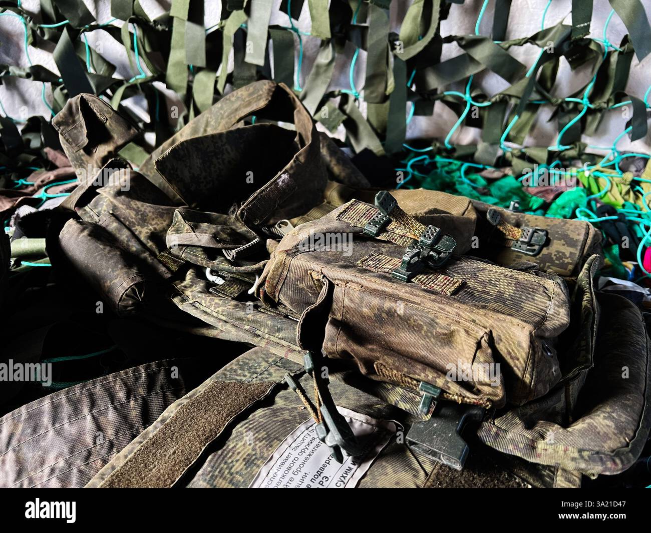 Velykyi Khodachkiv,Ukraine - March 10, 2025: Military backpack with ...