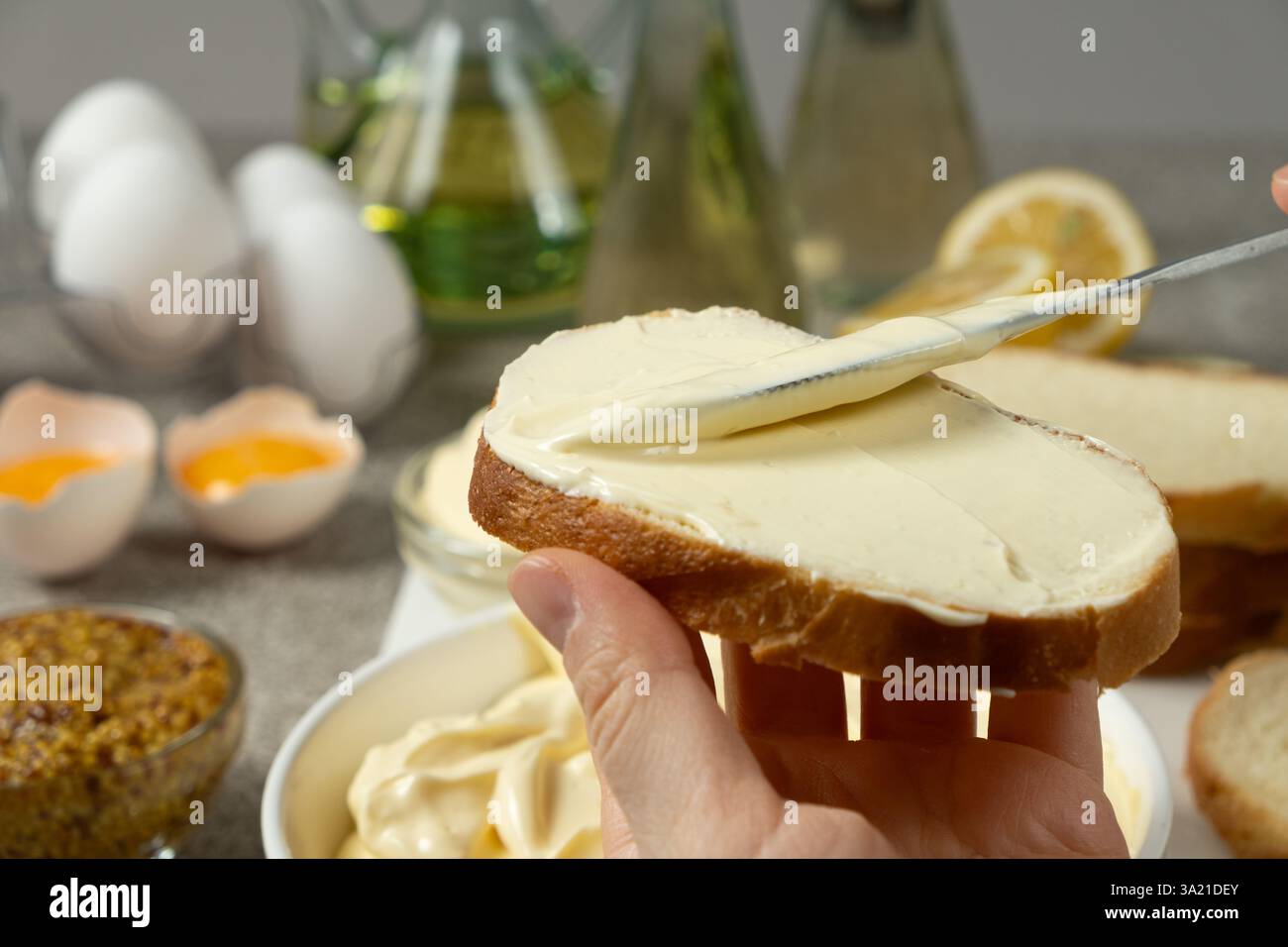 Thick mayonnaise spread on bread hi-res stock photography and images ...