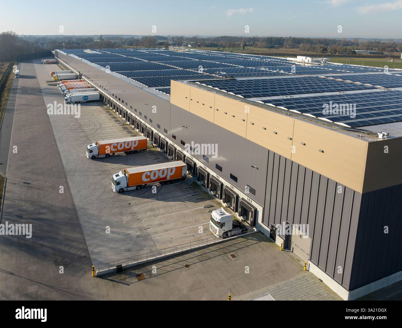 DEVENTER, NETHERLANDS - MARCH 8, 2025: Aerial view of a COOP warehouse ...