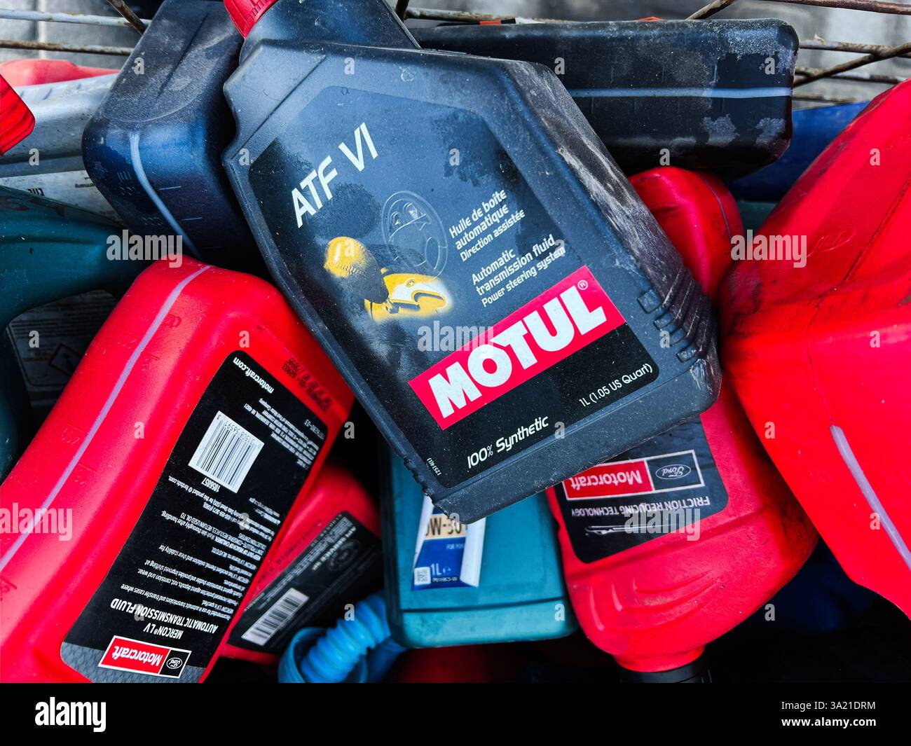 Kyiv, Ukraine - March 10, 2025: Automotive Motul fluid containers of ...