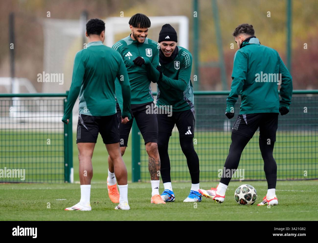 Aston Villa's Tyrone Mings (centre left) and Morgan Rogers (centre ...