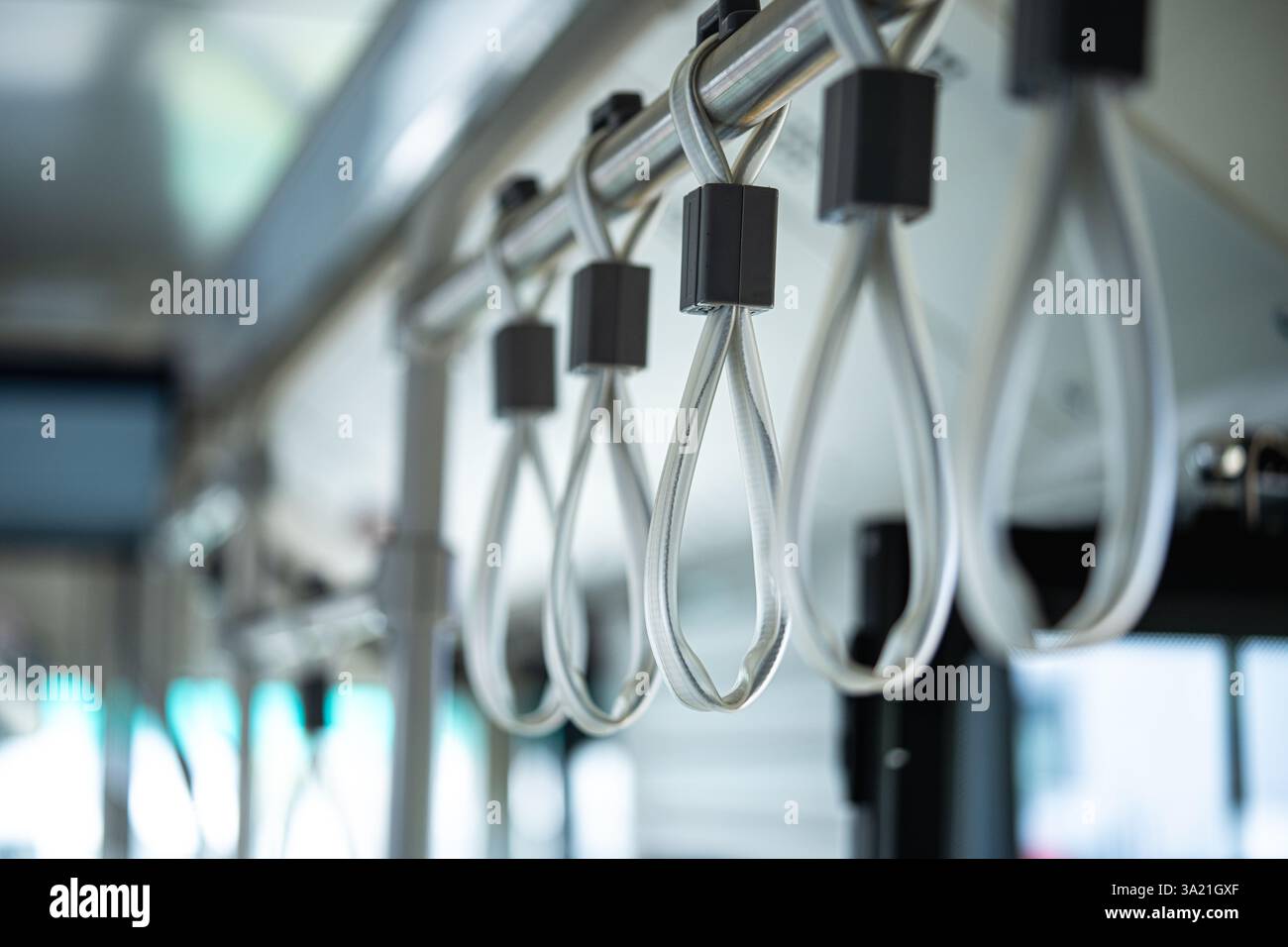 Handles standing passenger inside bus transportation hi-res stock ...
