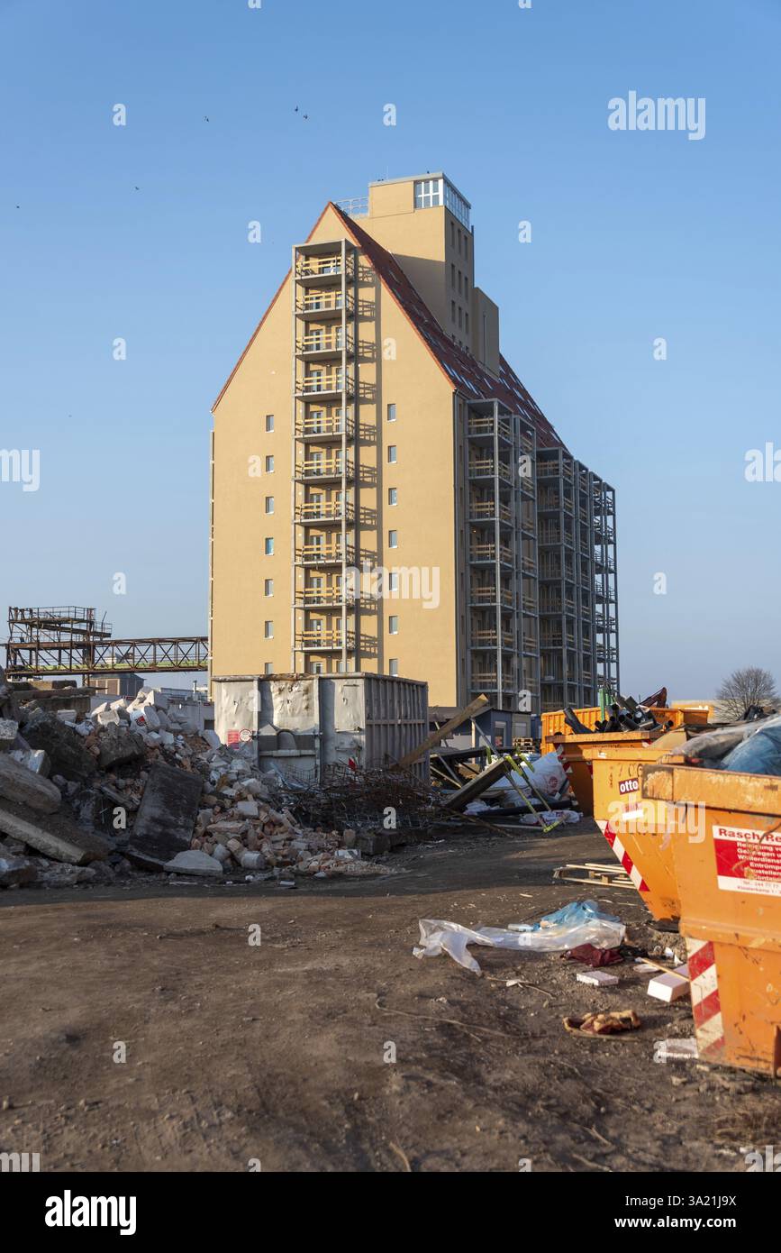 Construction site with high-rise building and crane, surrounded by ...