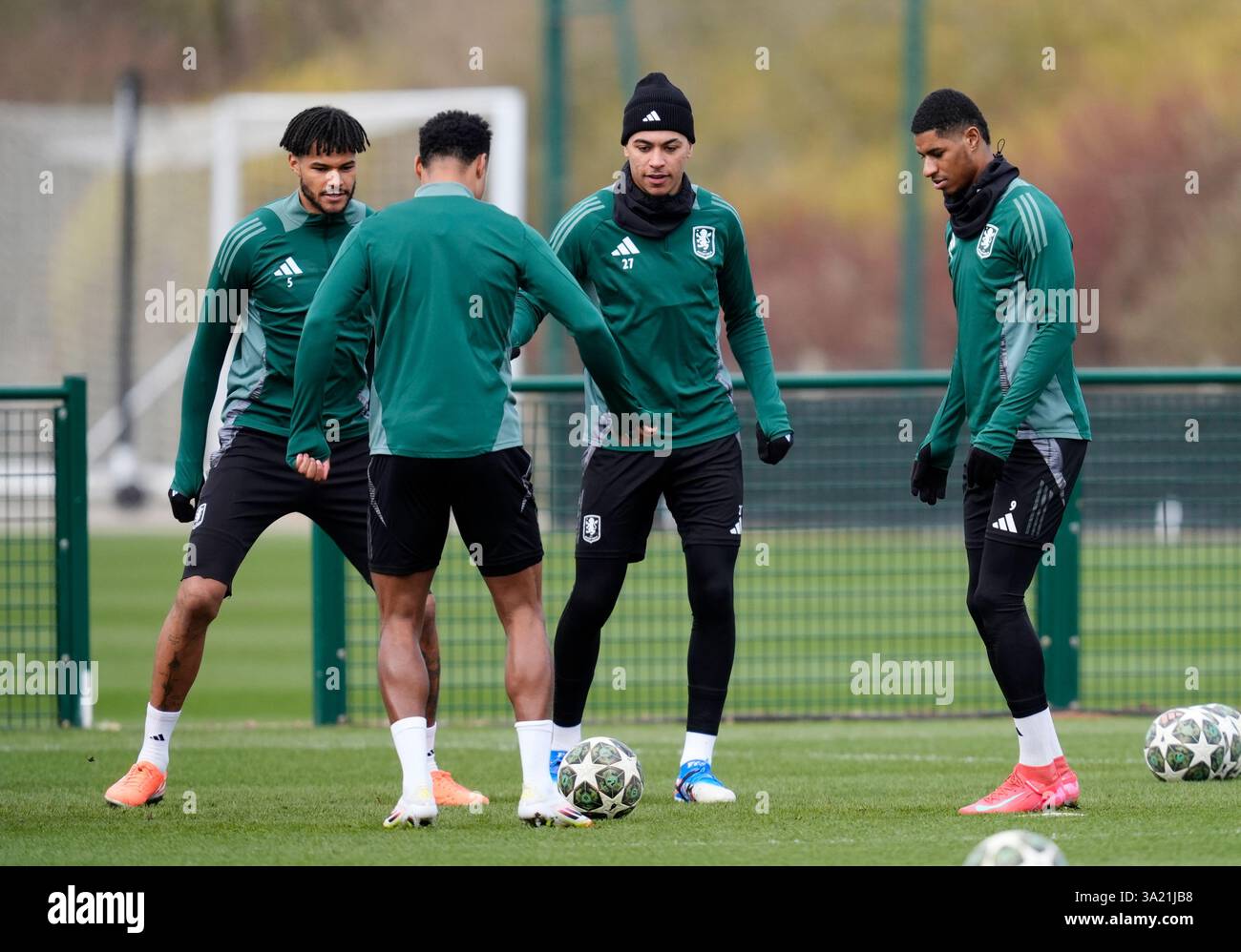 Aston Villa's Marcus Rashford (right), Morgan Rogers (centre) and ...