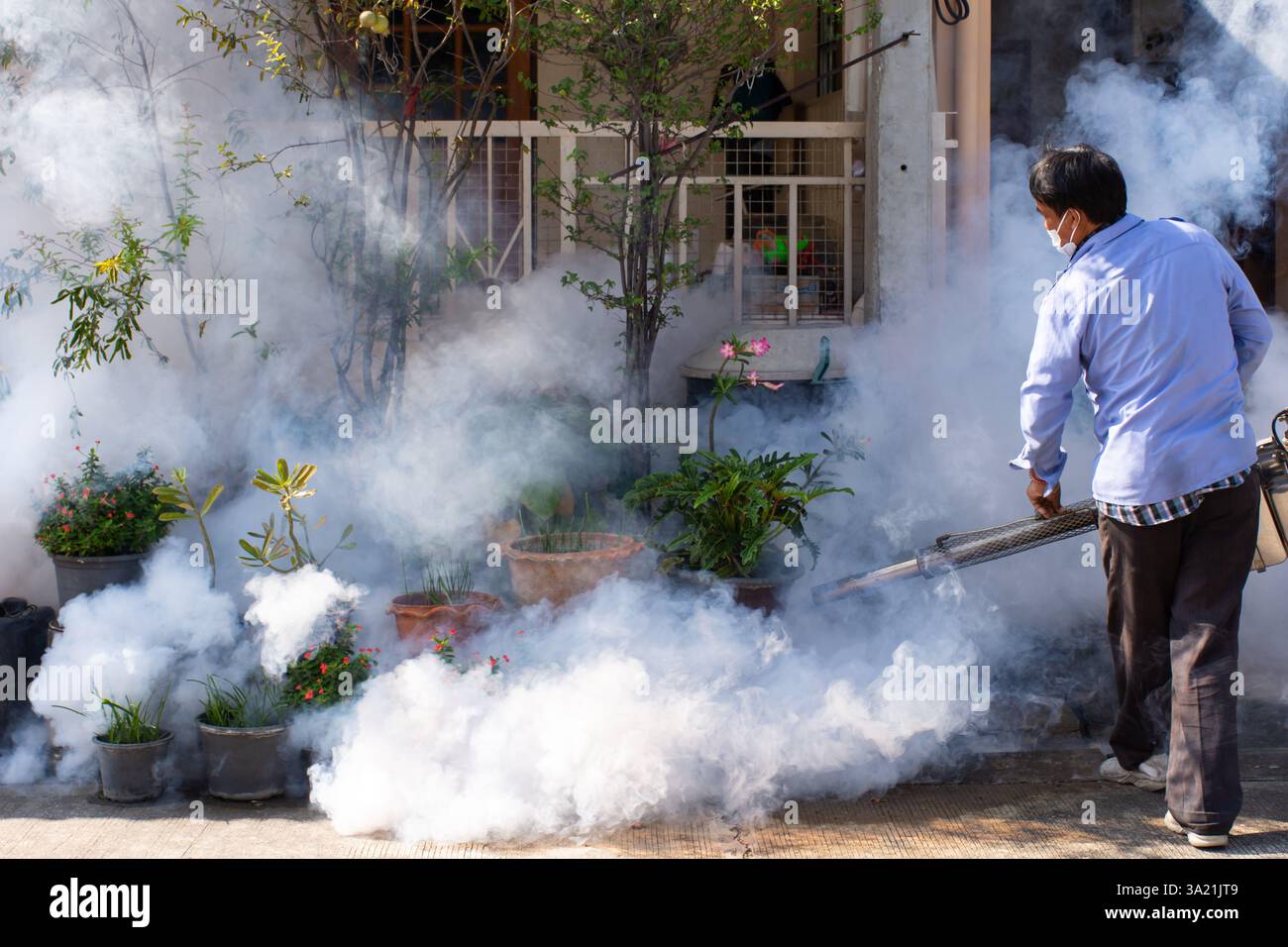 People fogging DDT spray for mosquito kill and protect by control ...