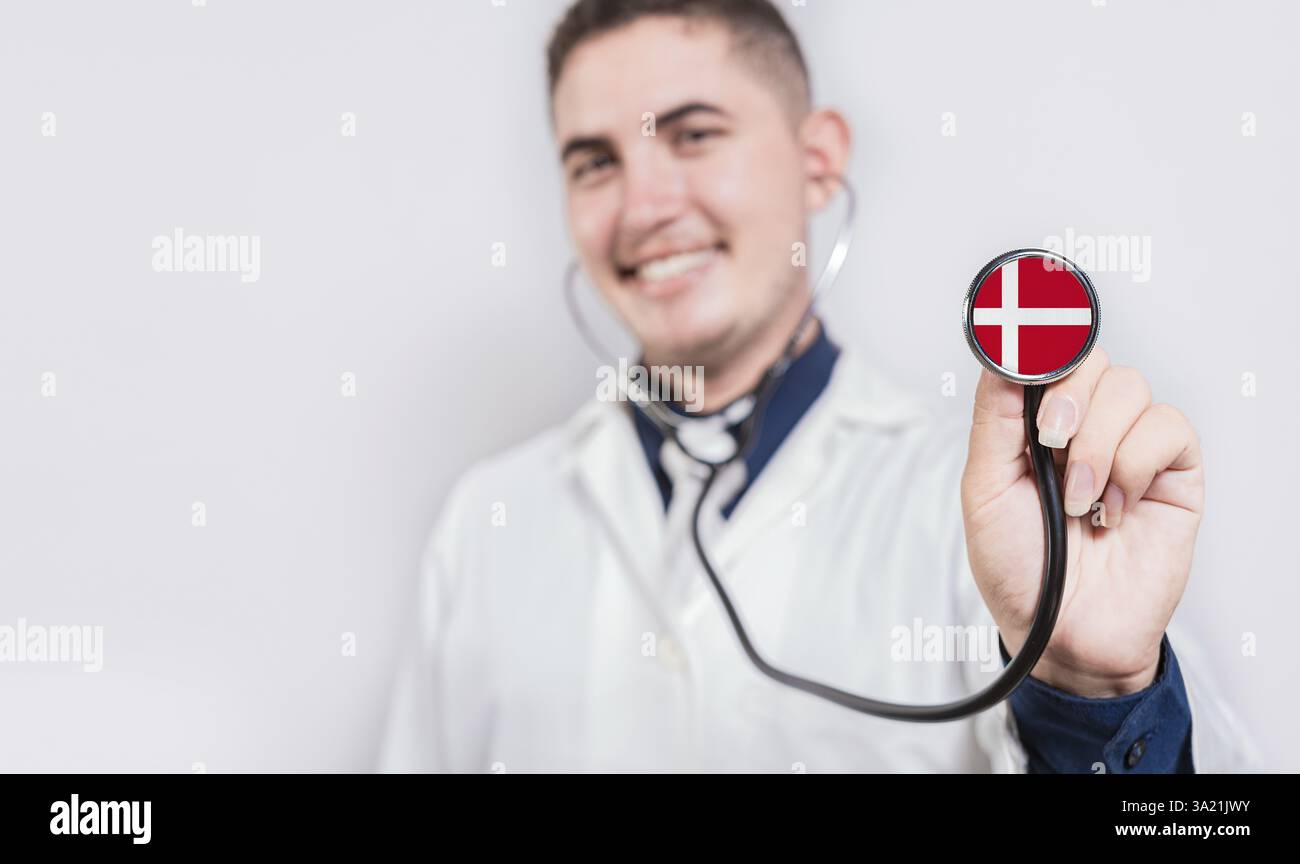Doctor showing stethoscope with Denmark flag. Denmark national ...