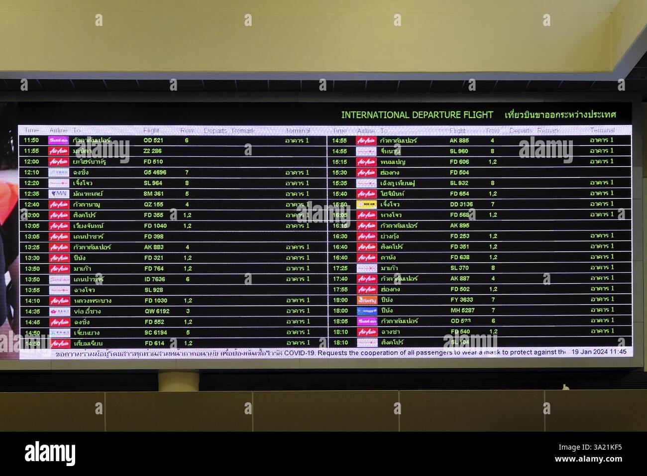 Display board for international departures in Thai at the old Bangkok ...