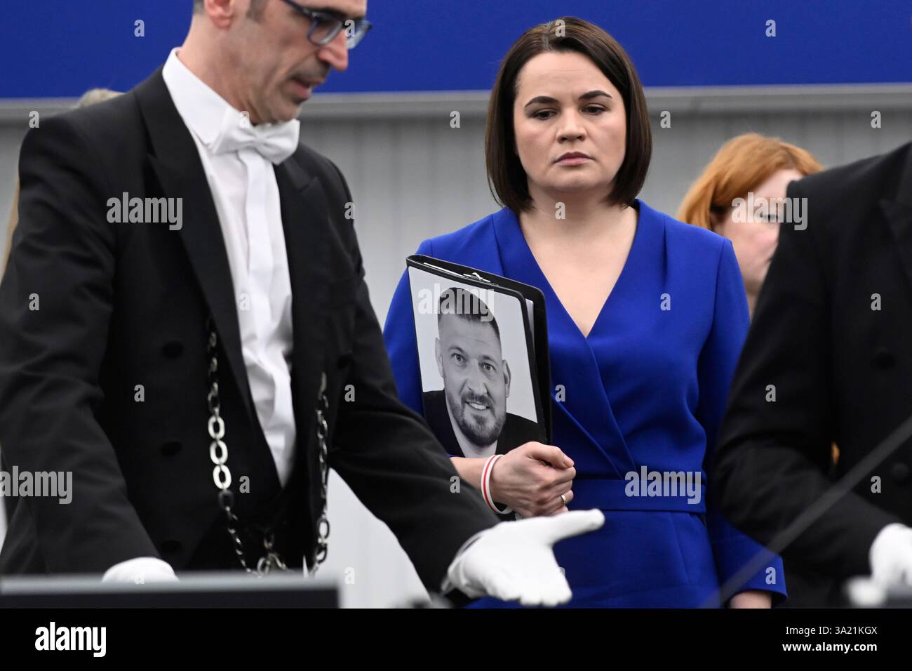 Belarusian opposition leader Sviatlana Tsikhanouskaya holds a photo of ...