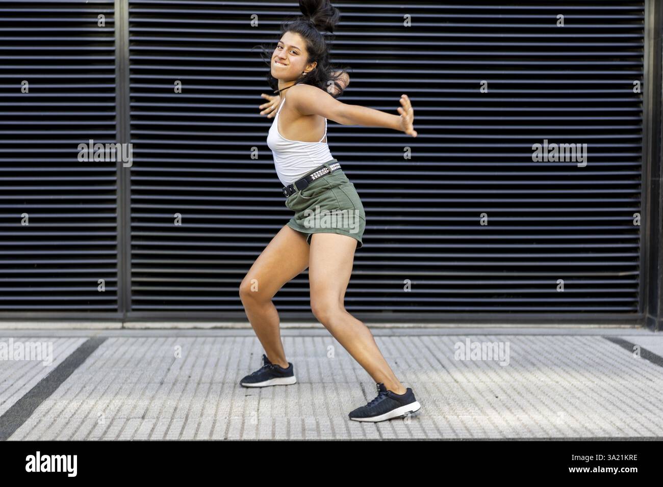 Confident young woman embracing her individuality Stock Photo - Alamy