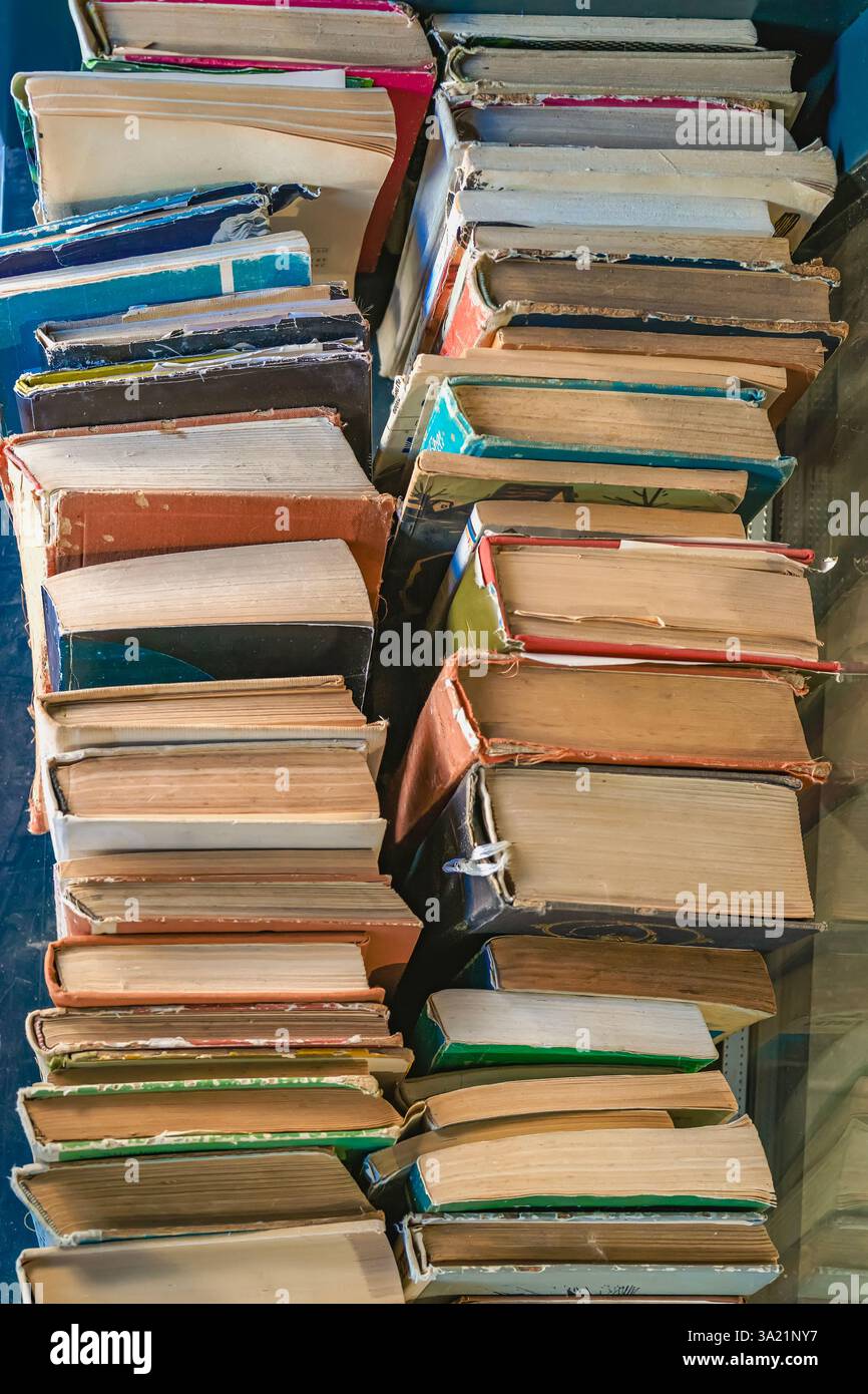 Pile of old books. Stack of aged books with worn covers and yellowed ...