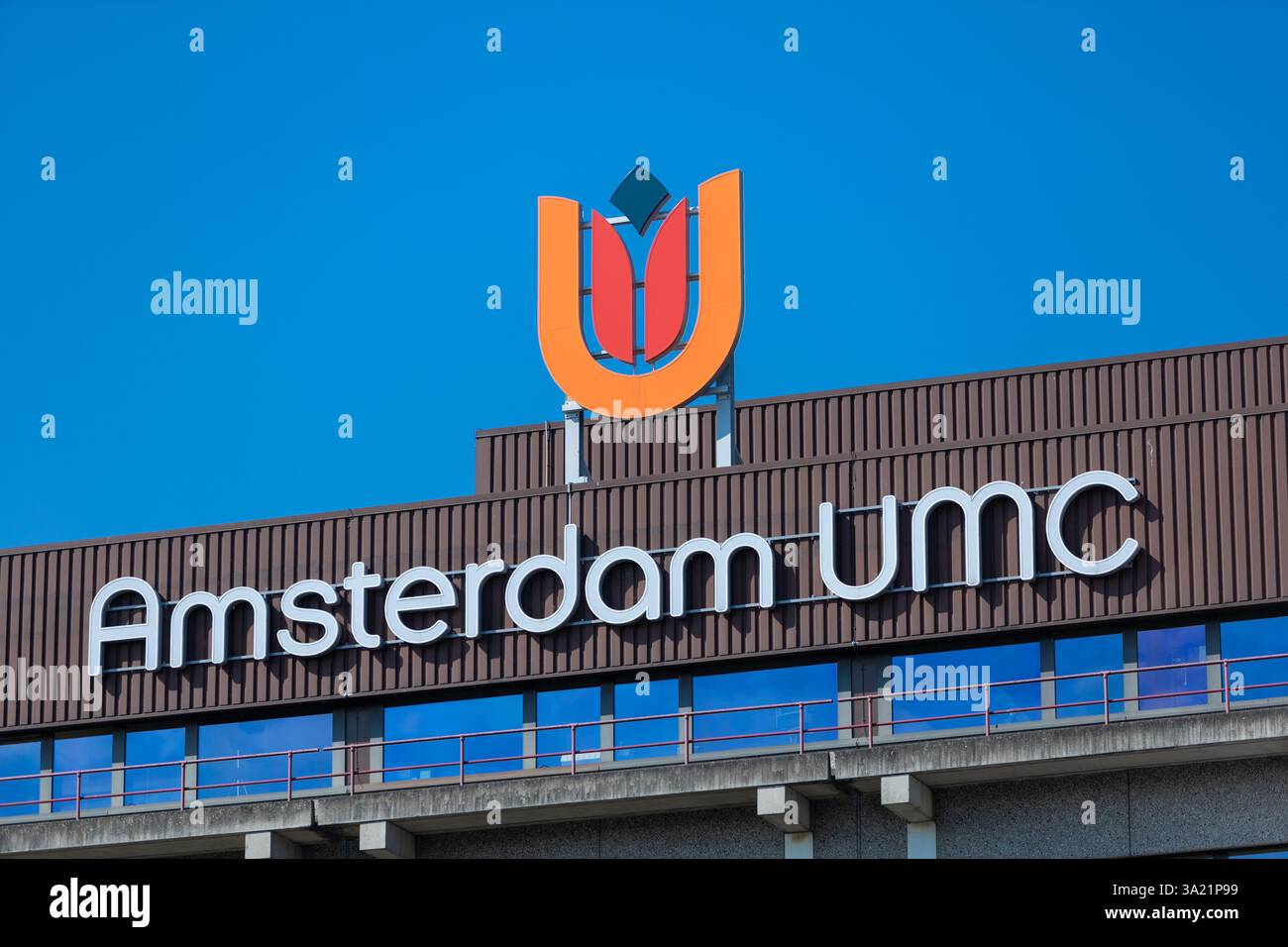 Amsterdam UMC Sign logo on the hospital. Amsterdam UMC is a medical ...