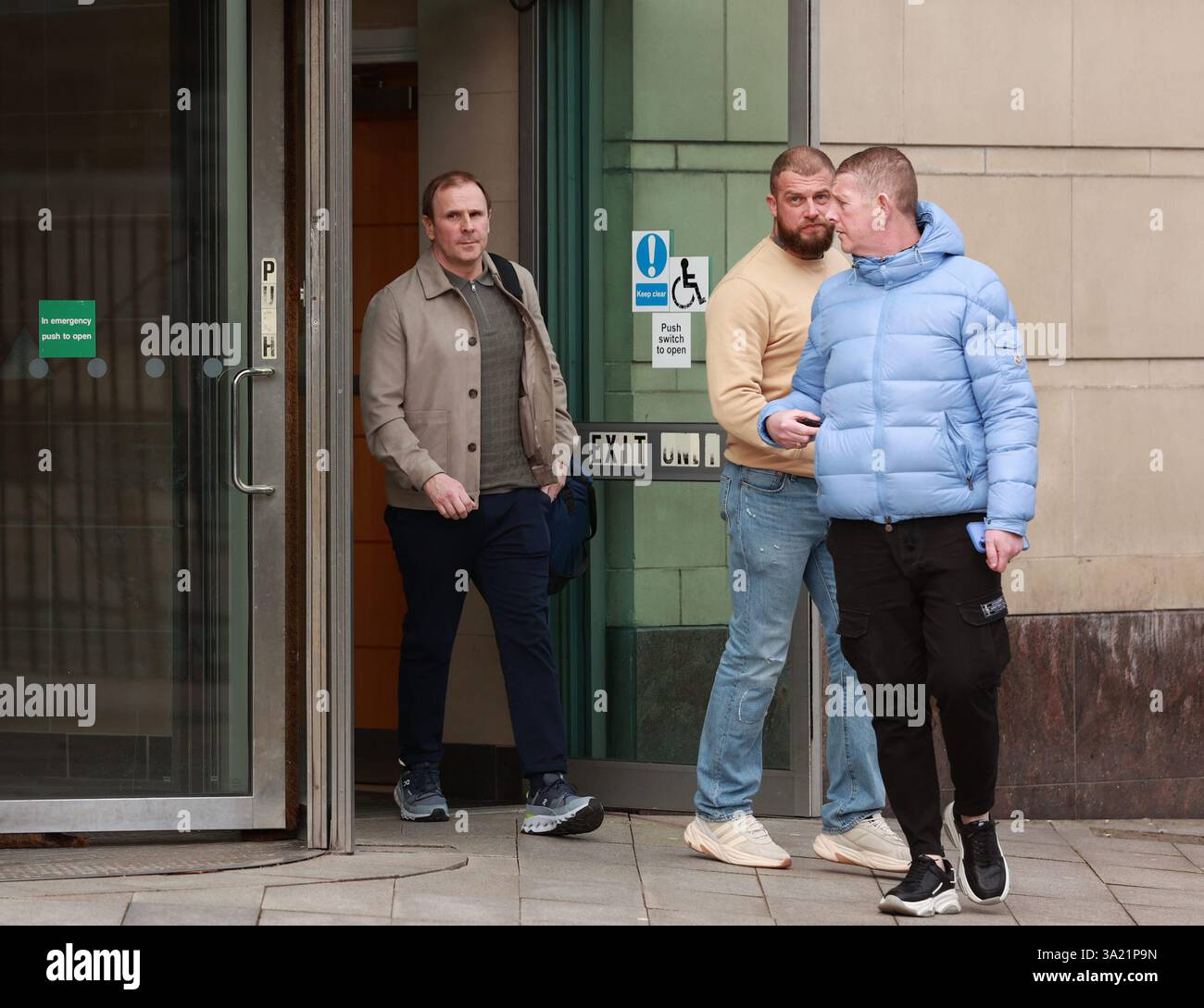 Winston Irvine (left) leaves Belfast Crown Court after his plea and ...