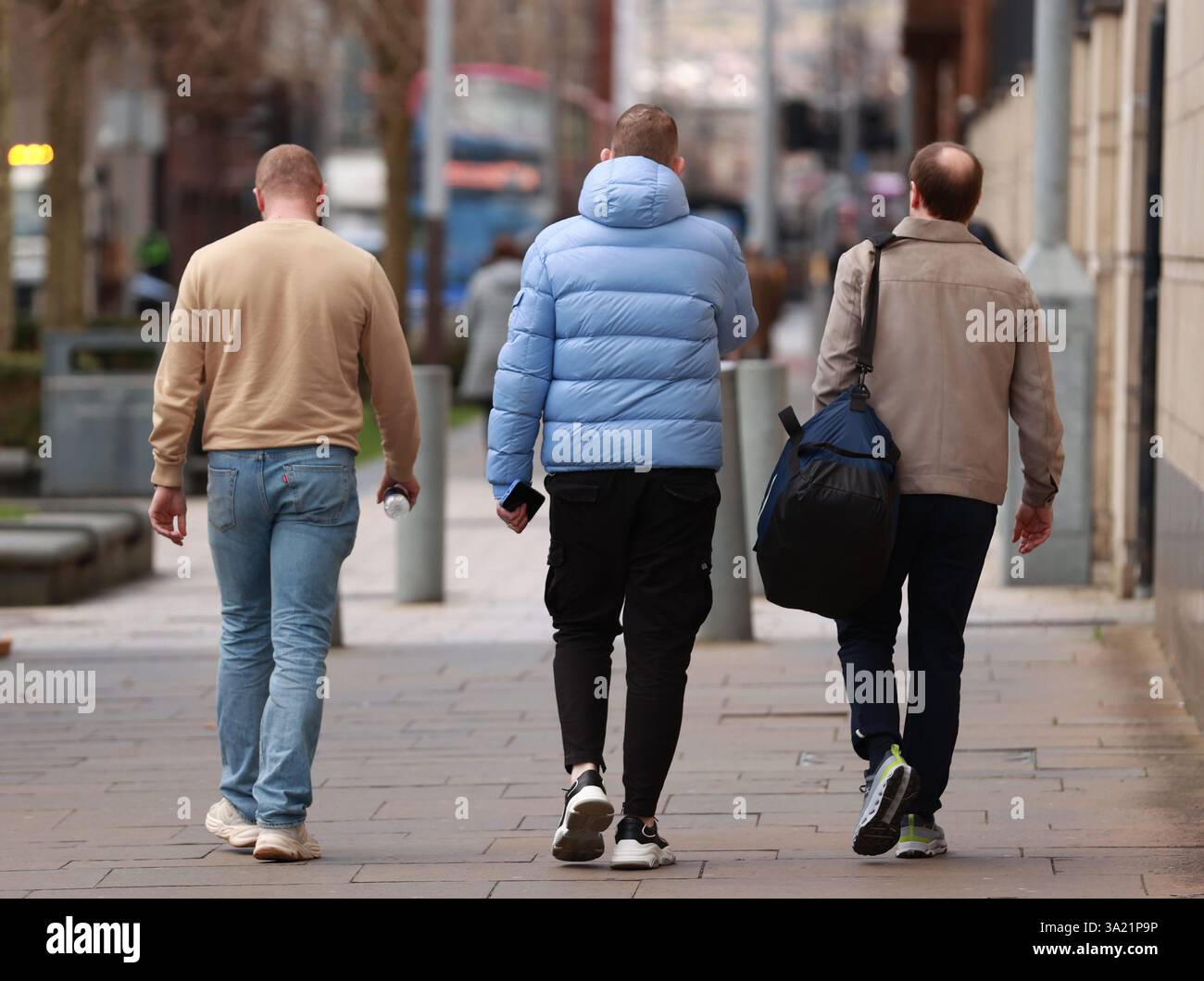 Winston Irvine (right) leaves Belfast Crown Court after his plea and ...
