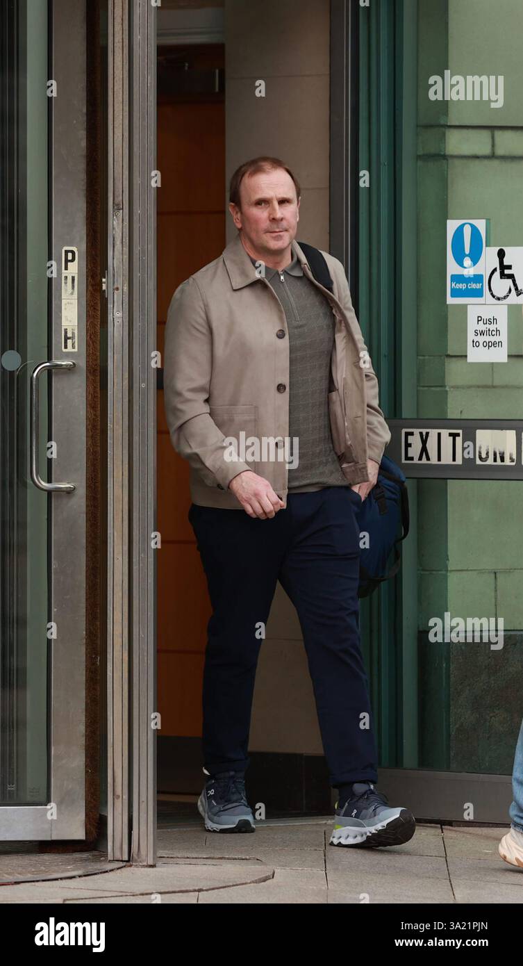 Winston Irvine (right) leaves Belfast Crown Court after his plea and ...