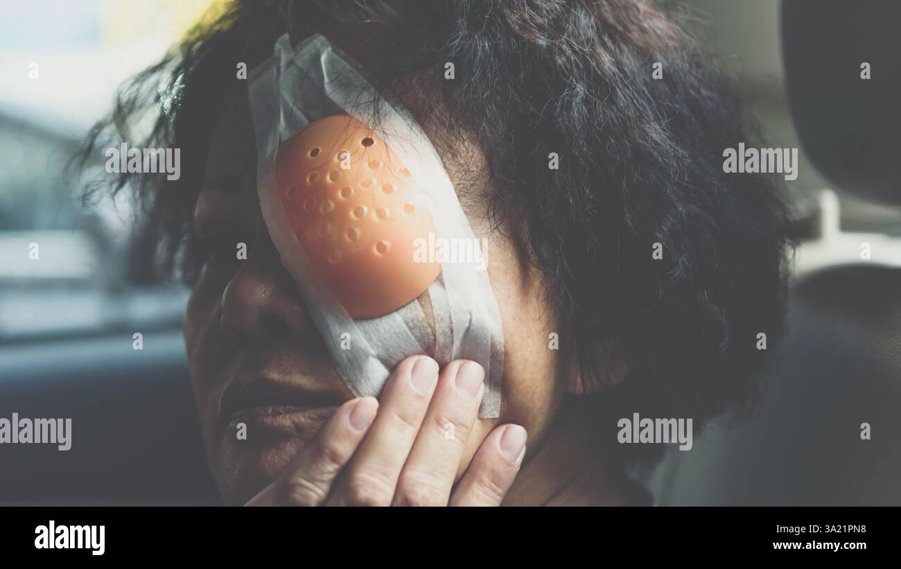 Patient asian elder women 60s with black hair and wrinkled on face show ...
