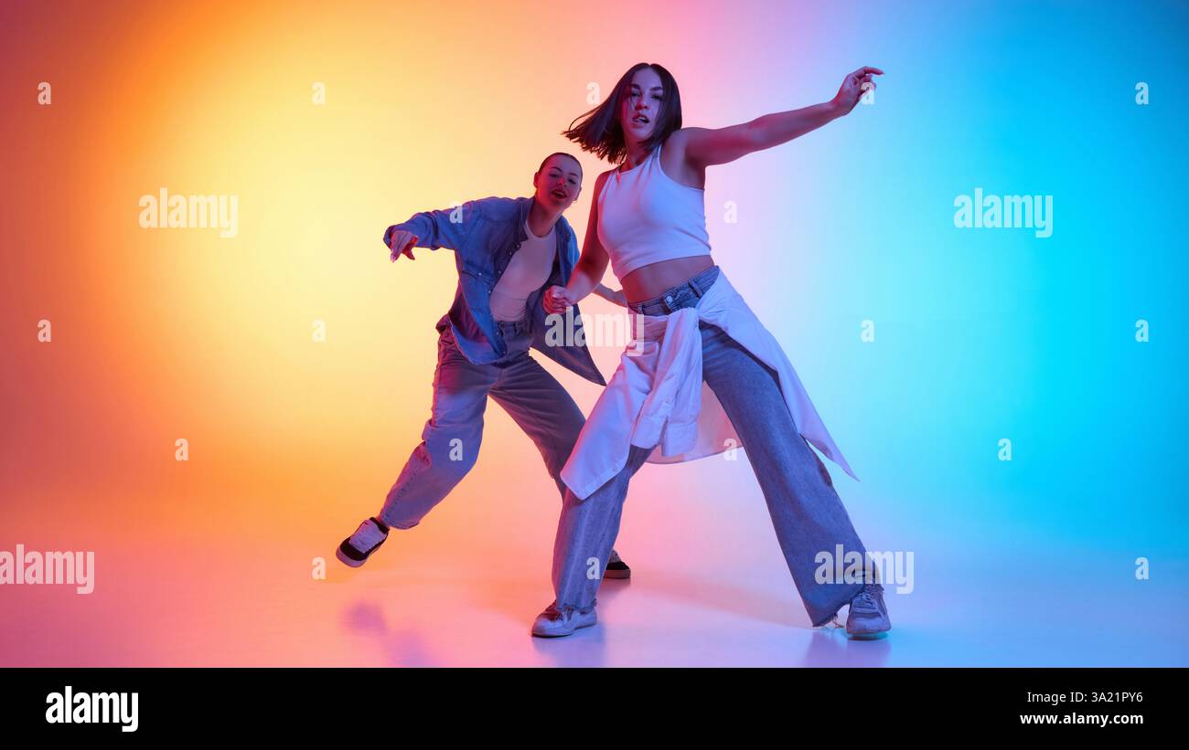 Modern hip hop fusion captured in motion with two dancers dancing ...