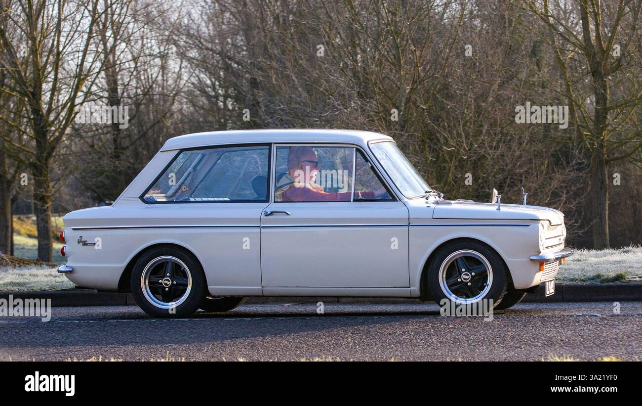 Stony Stratford,UK - Mar. 2nd 2025: 1972 Hillman Imp Super classic car driving on a British road ...