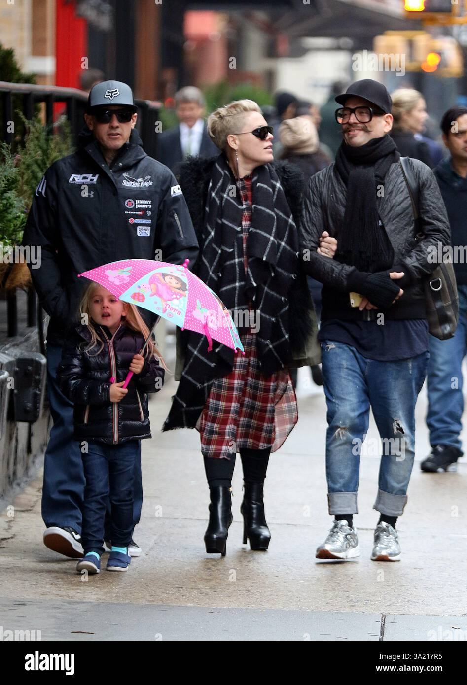 Singer Pink out in Tribeca with her husband Carey Hart and her daughter ...
