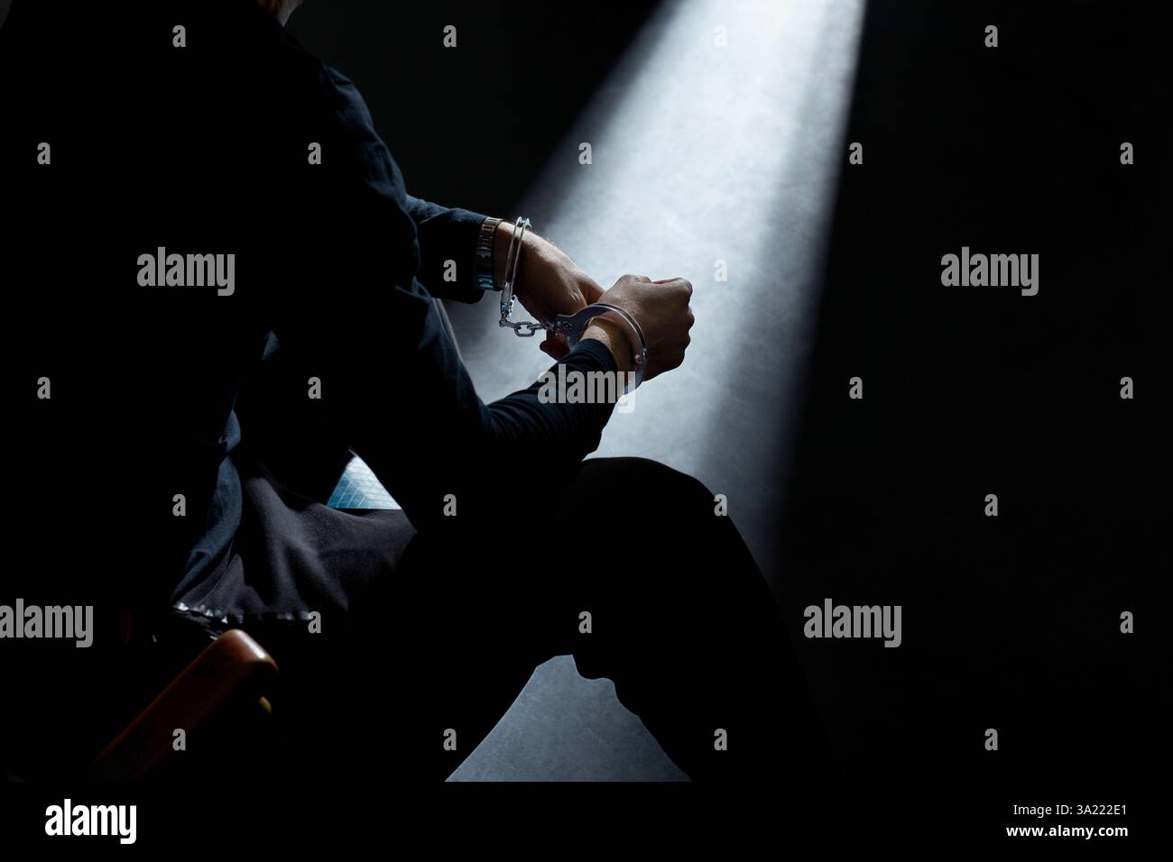 Man in prison beam of light hi-res stock photography and images - Alamy