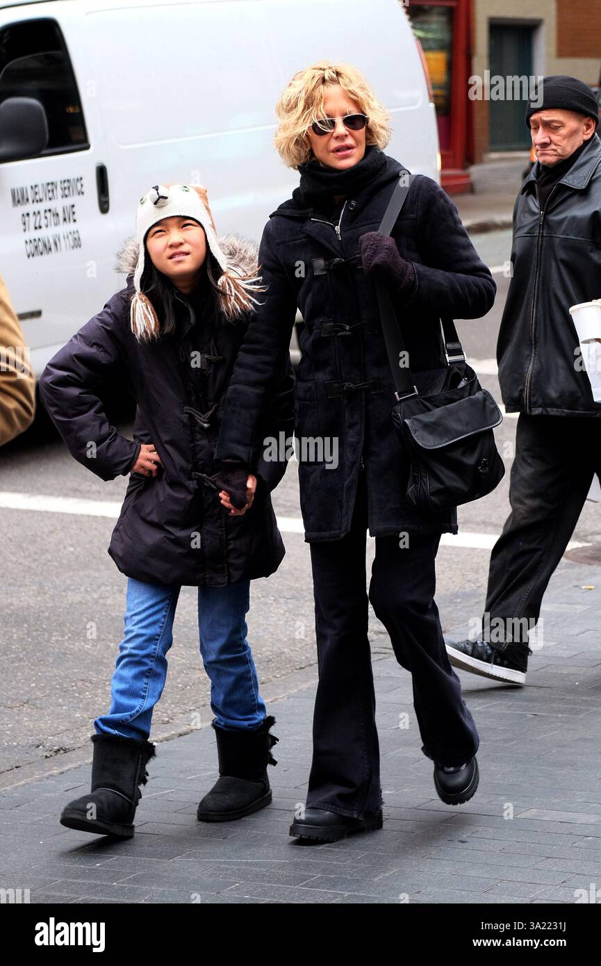 Meg Ryan walks in Soho with her daughter Daisy True Ryan on December 21 ...
