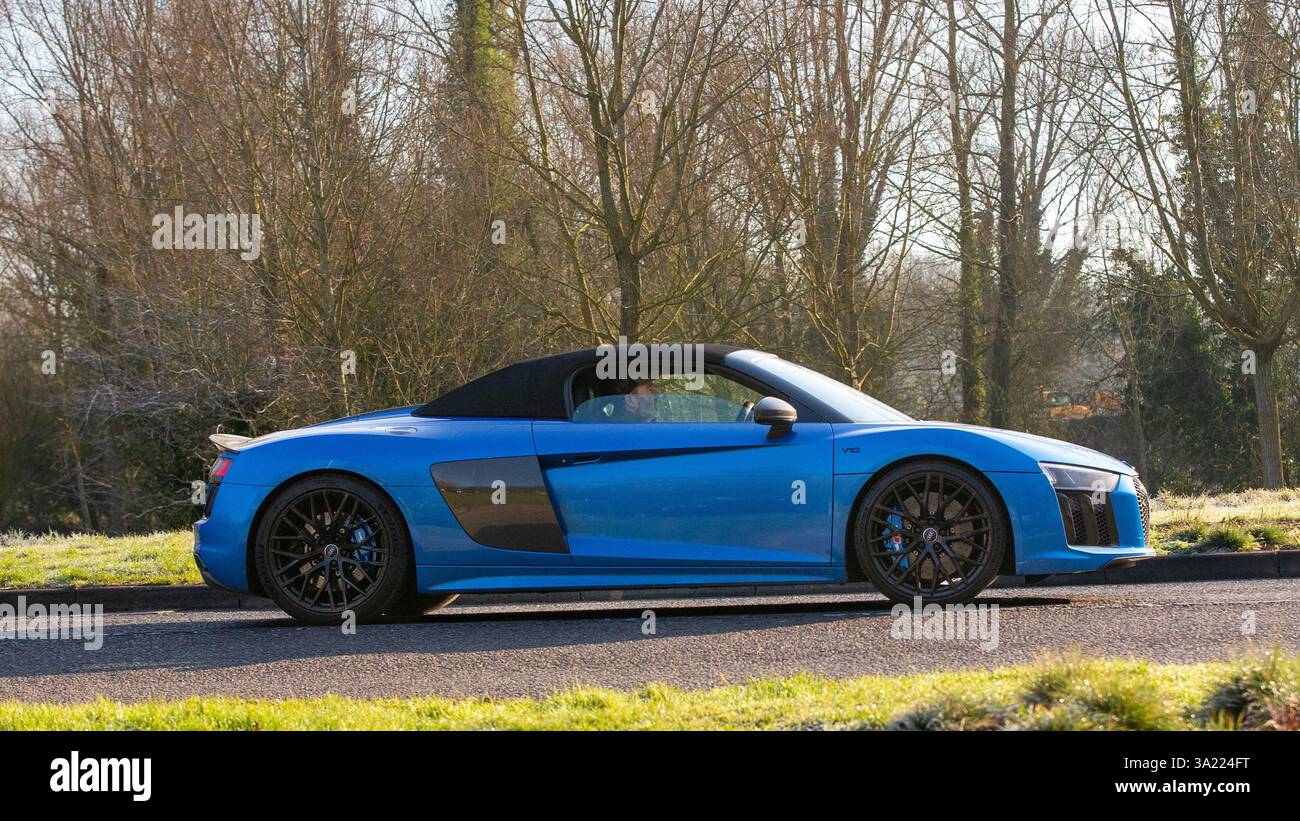 Stony Stratford,UK - Mar. 2nd 2025: 2016 blue Audi R8 car driving on a ...