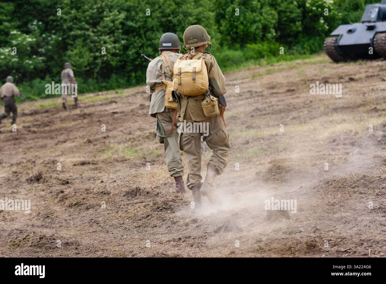 American paratroopers soldiers fight on the field during the ...