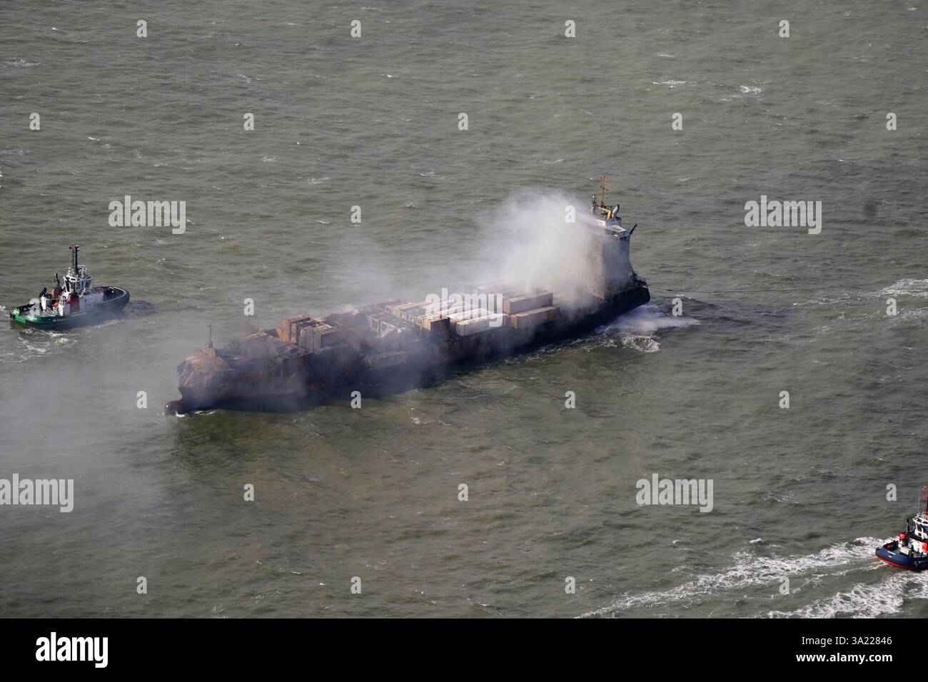 Tug boats shadow the Solong container ship as it drifts in the Humber ...