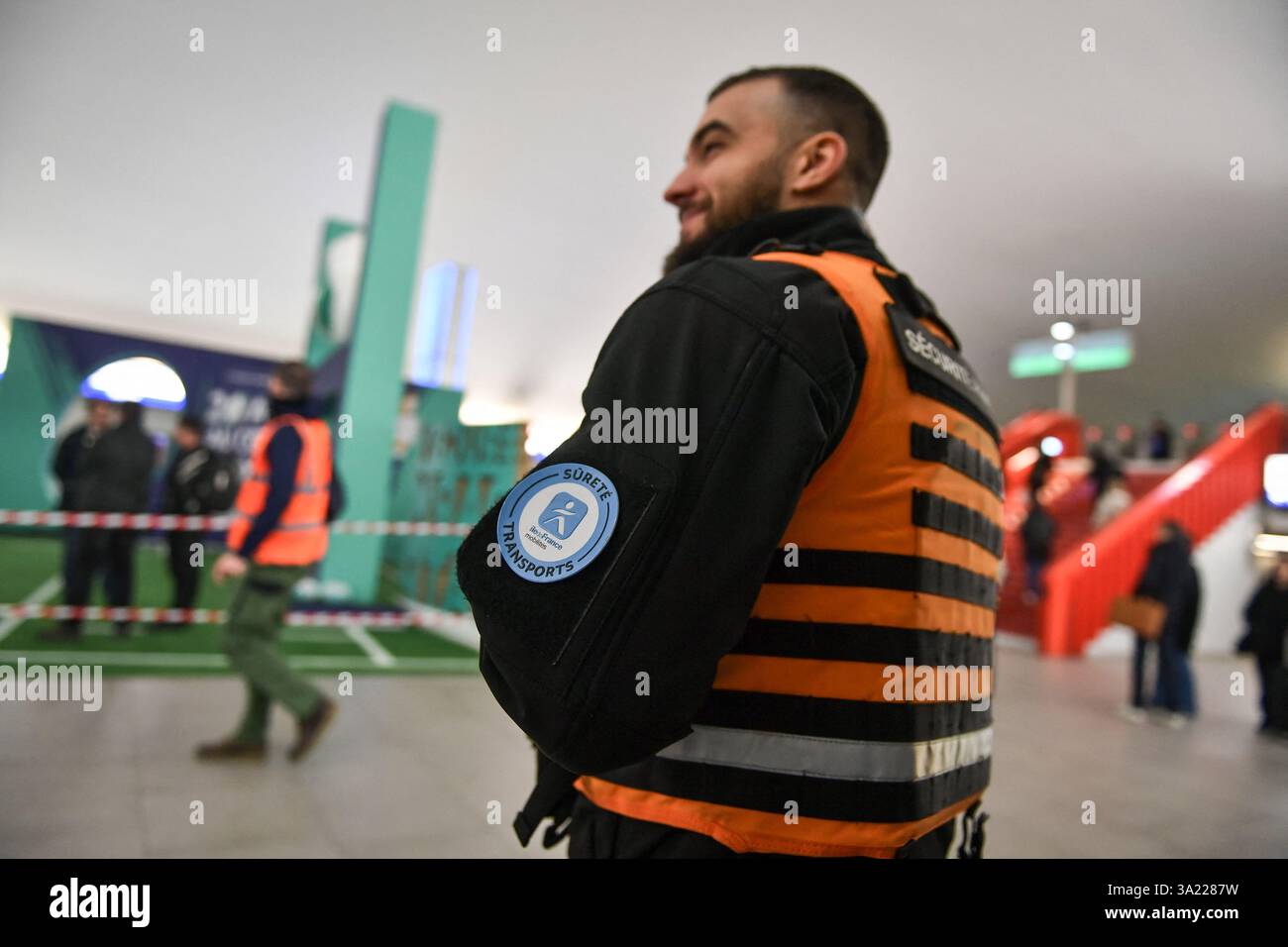 Paris, France. 11th Mar, 2025. A RATP security guard stands at the RER ...