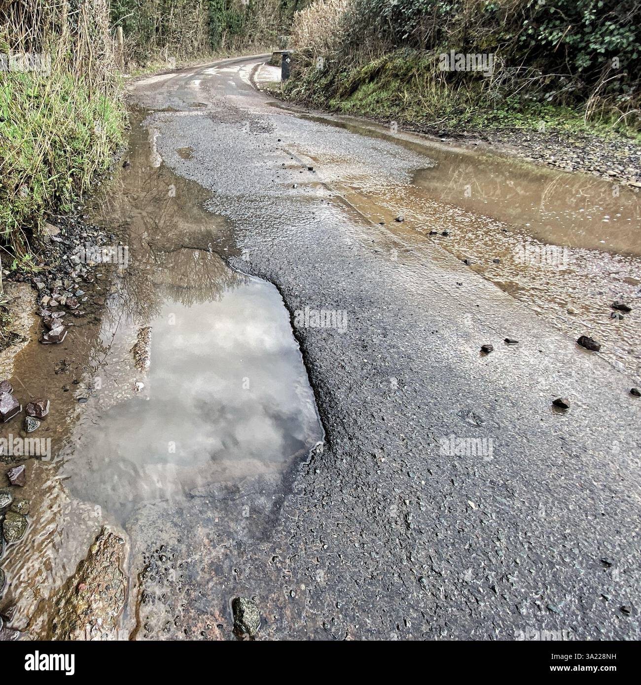 Concealing how deep the pothole is hi-res stock photography and images ...