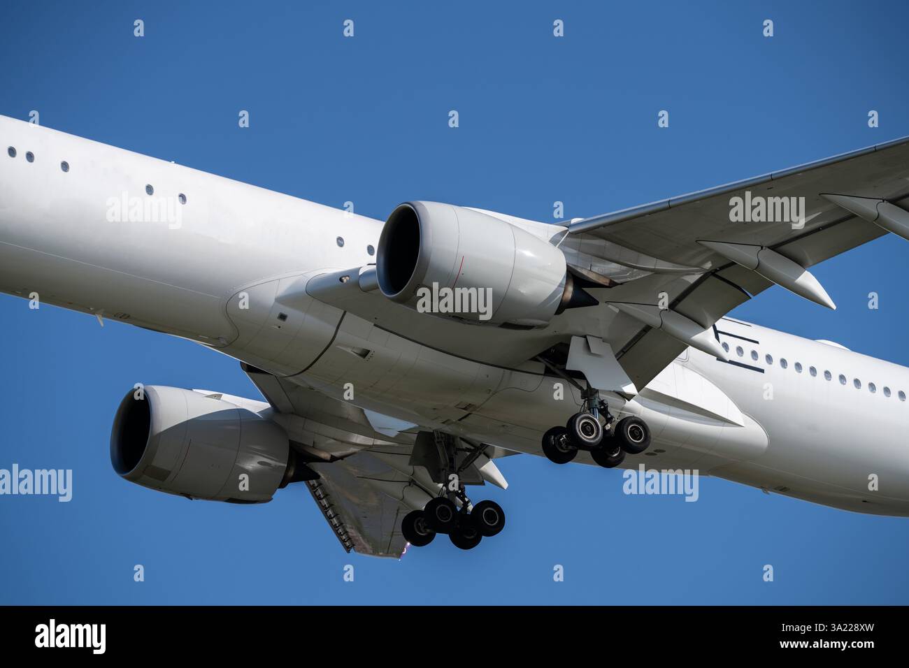 Modern commercial aircraft landing at international airport against ...