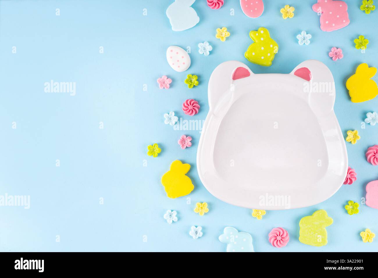 Cute Easter table setting background with Easter bunny plate, sugar ...