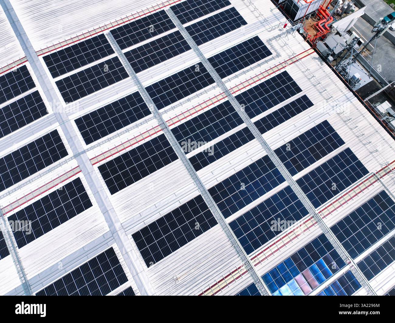 Solar-powered warehouse facility. Modern distribution center with ...