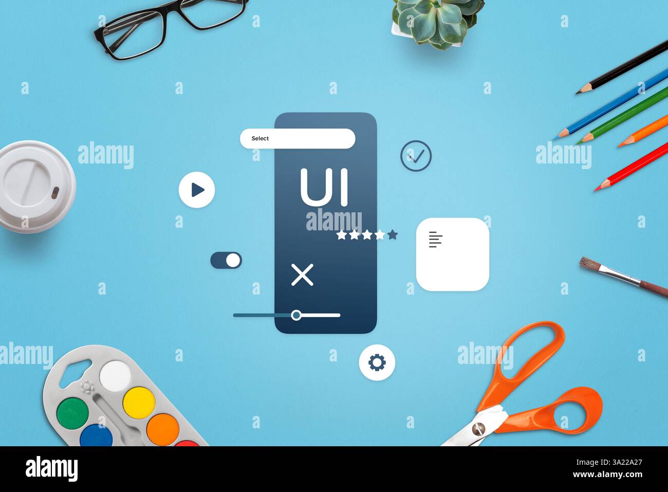 Creative workspace for mobile app development, top view of UI design ...