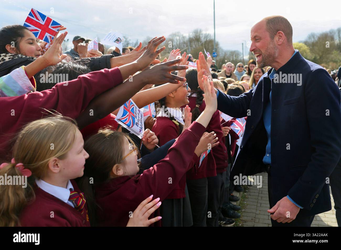 Britain's Prince William is greeted by well-wishers during an official ...