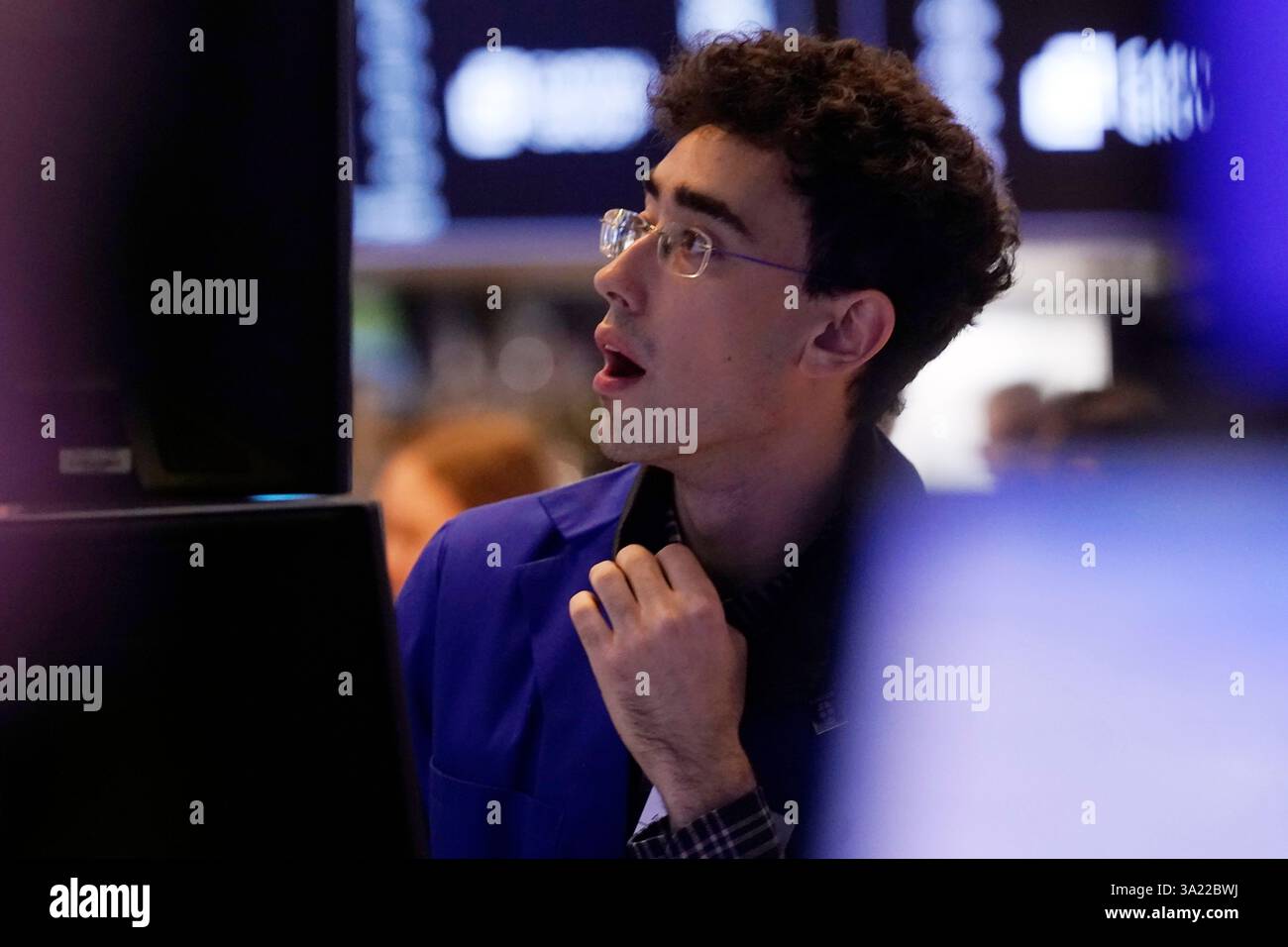 Specialist Alexander Weitzman work on the floor of the New York Stock ...