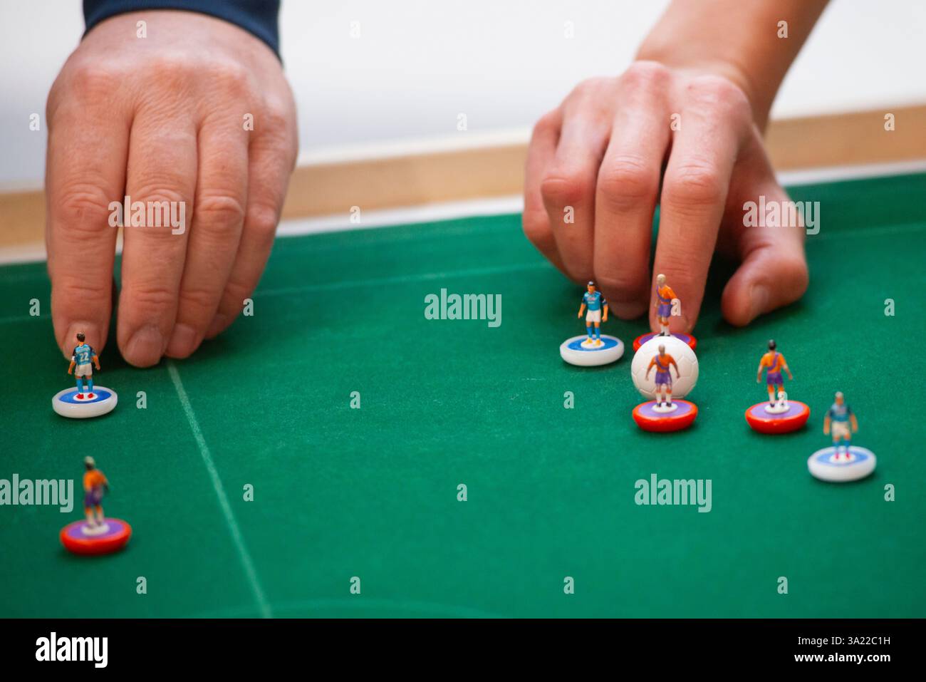 Man e Woman Playing Subbuteo Table Football Stock Photo - Alamy
