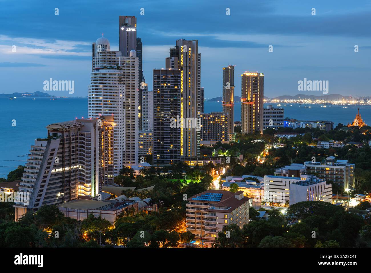 Evening view of hotels, apartment buildings and modern skyscrapers ...
