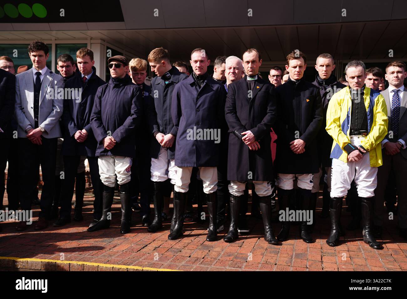 Jockeys pay their respects to Michael O'Sullivan before the first race ...