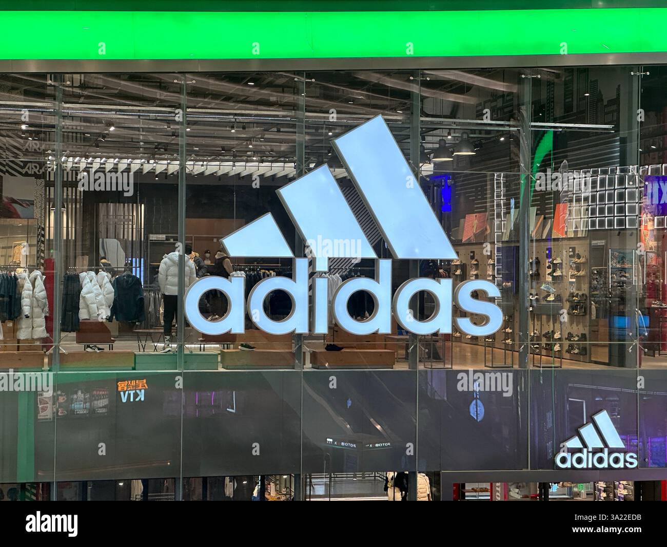 Chongqing, China - Dec 5, 2023: Adidas store sign. Adidas AG is a ...