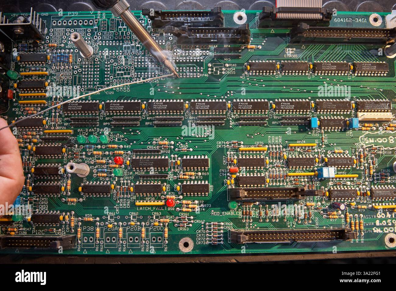 Electronics repair soldering microchips circuit hi-res stock ...