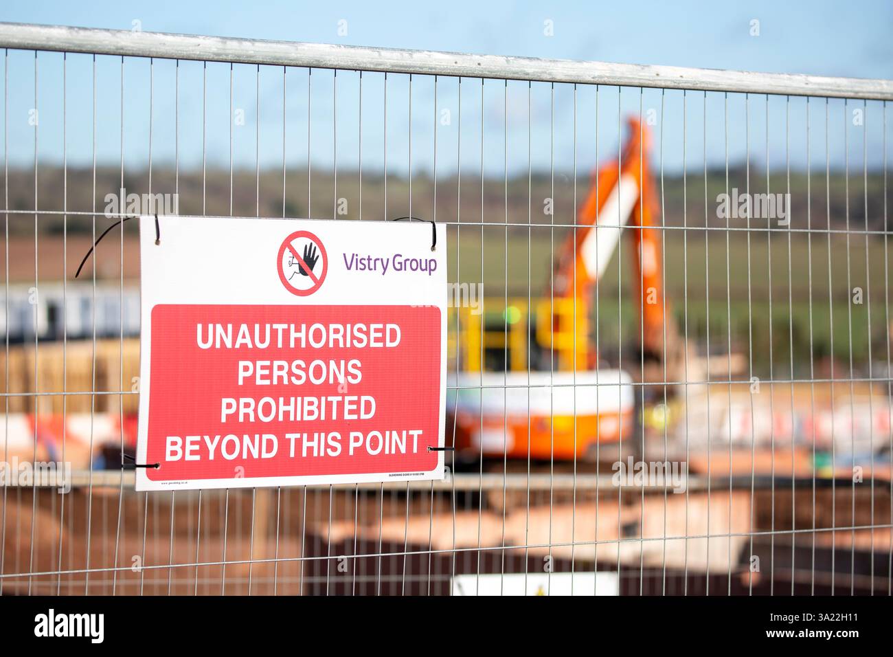Vistry Group sign on a building site fence explaining that ...