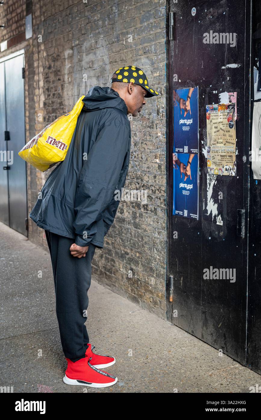Man looking at poster, Copeland Park, Peckham's Cultural Quarter ...