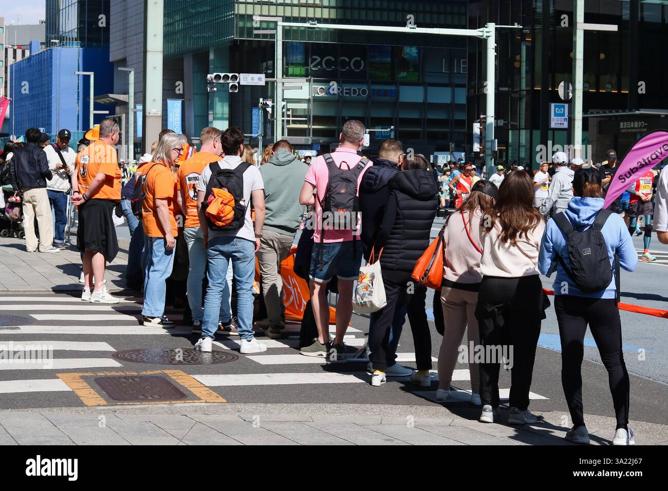 TOKYO, JAPAN - March 2, 2025: People watching the Tokyo Marathon 2025 ...