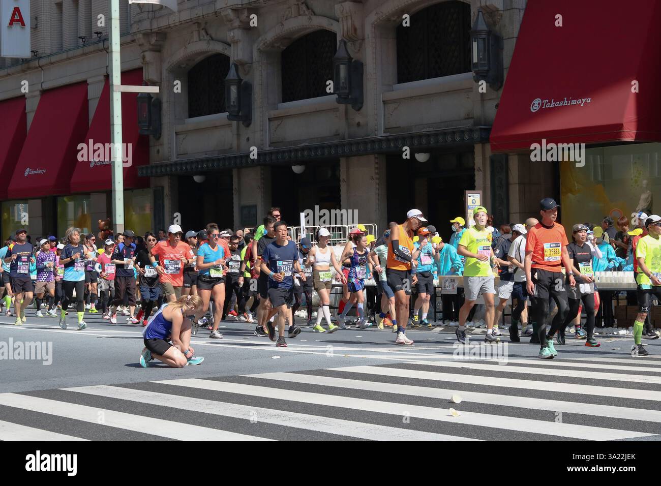 TOKYO, JAPAN - March 2, 2025: Scene from the Tokyo Marathon 2025 with ...